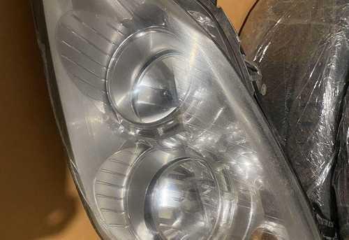 Левая фара Opel Astra H