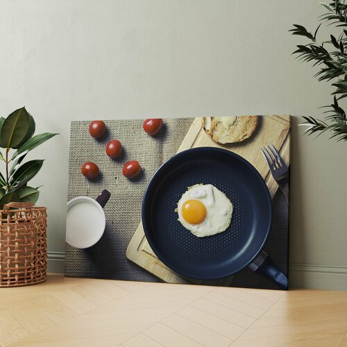 Картина на холсте "Яйцо на сковороде рядом с чашкой молока и помидорами черри" 60x80 см. Интерьерная, на стену.