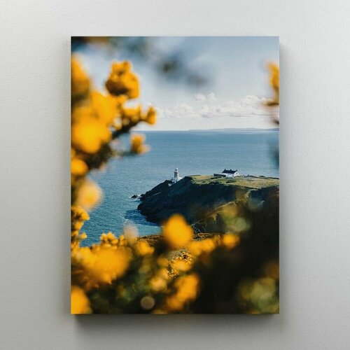 Интерьерная картина на холсте "Пейзаж - маяк у моря и желтые цветы" размер 22x30 см