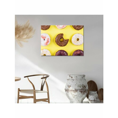 Картина на холсте с подрамником Разные пончики на жёлтом фоне 60х80