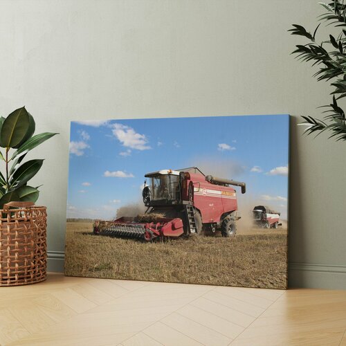 Картина на холсте "Красный трактор едет по полю" 40x60 см. Интерьерная, на стену.