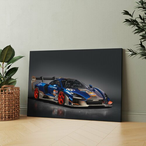 Картина на холсте "Синий и оранжевый гоночный автомобиль на темном фоне" 20x30 см. Интерьерная, на стену.