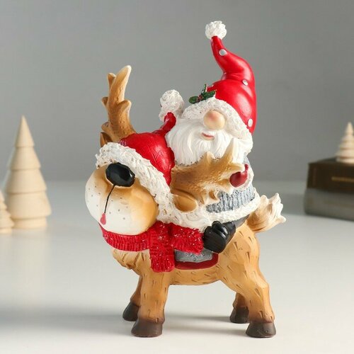 Сувенир полистоун "Дед Мороз верхом на олешке в красном колпаке и шарфике" 8х14х23 см