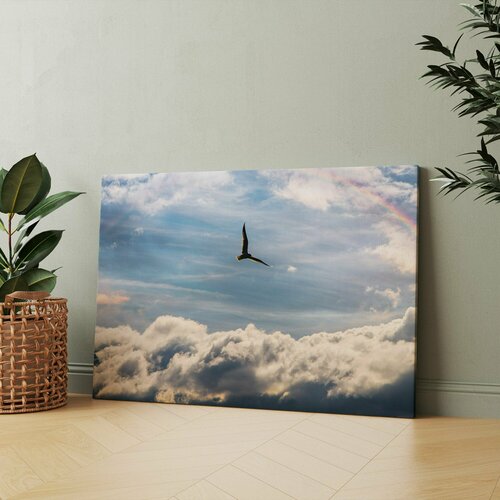 Картина на холсте "Птица летит в небе на фоне радуги" 20x30 см. Интерьерная, на стену.
