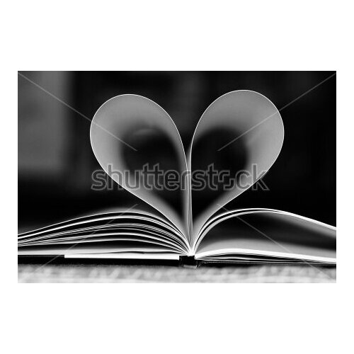 Постер на холсте Загнутые в форму сердца страницы книги 45см. x 30см.